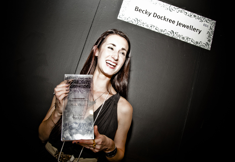 WB to create emerging designer's work in platinum