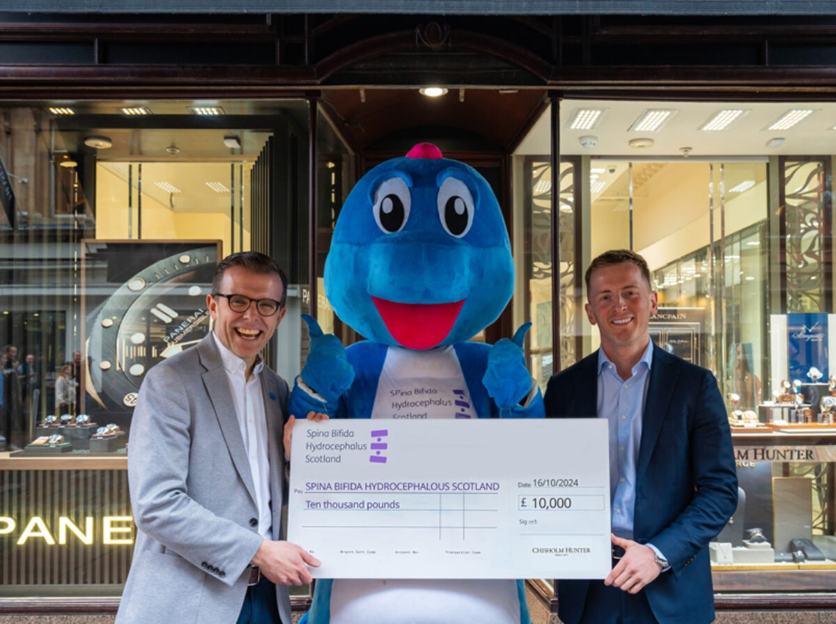 Chisholm Hunter presents £10k cheque to leading disability charity